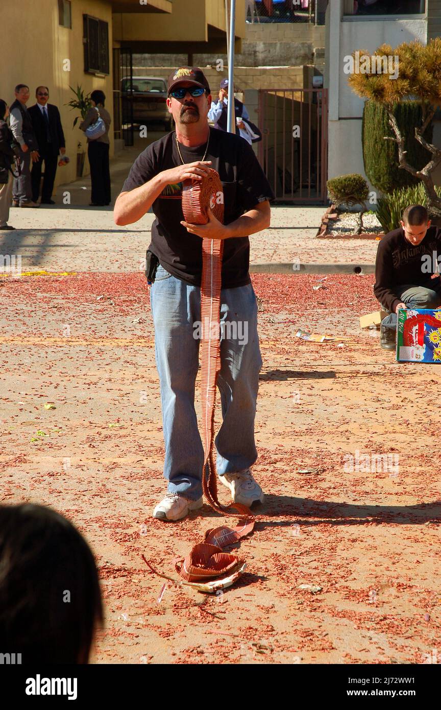 A man lighting fireworks hi-res stock photography and images - Alamy