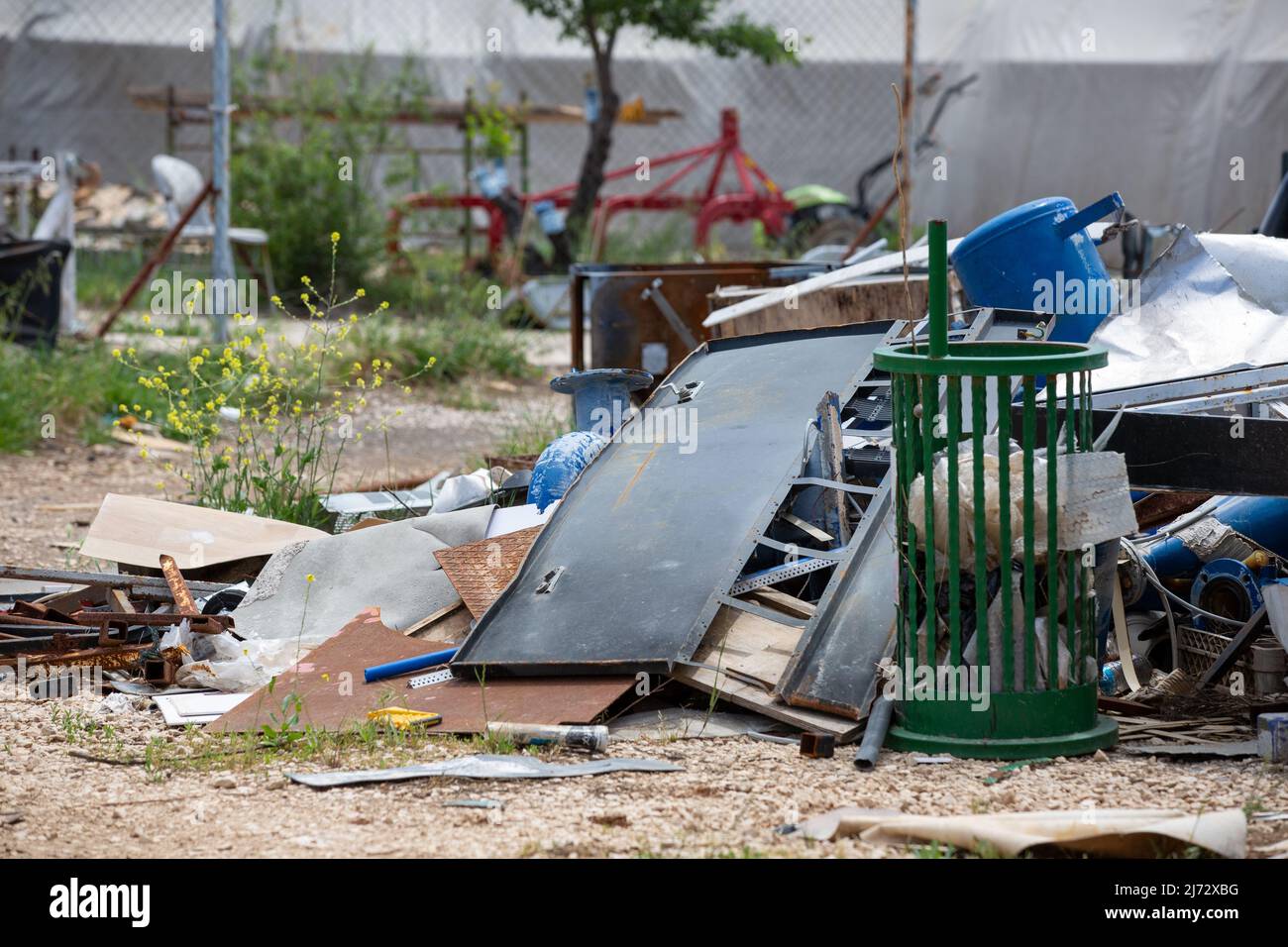 Various scrap items and materials collected for sale as second hand ...