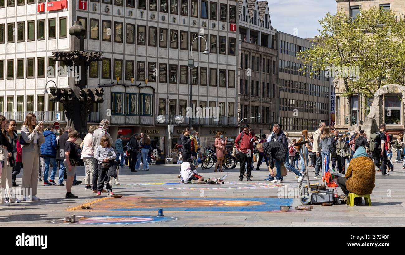 Tourists enjoying free time in Cologne old town Stock Photo - Alamy