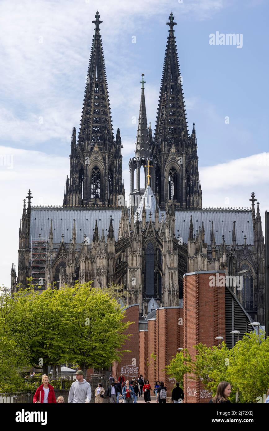 Cologne Cathedral twin towers rising above city skyline on a bright ...