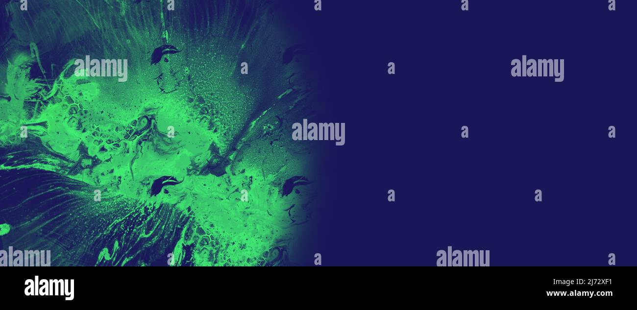 Eye catching florescent green spray of paint on dark blue 4K screen ...