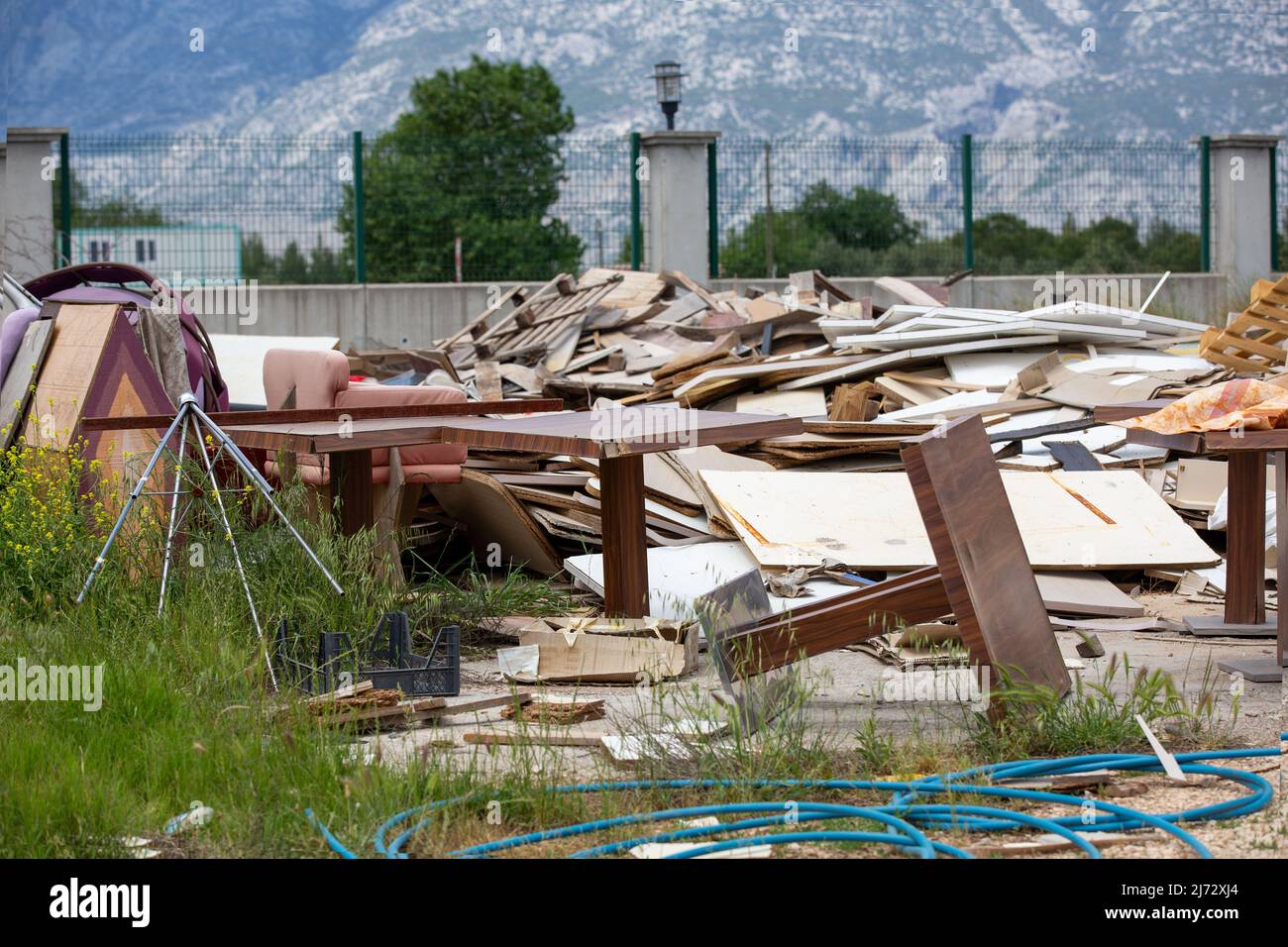 Various scrap items and materials collected for sale as second hand ...