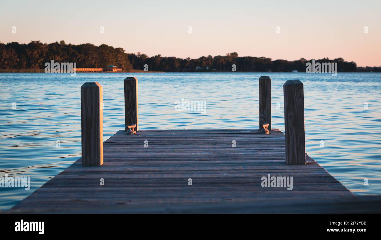 Sunset on Lake Dora dock in Mount Dora Florida Stock Photo - Alamy