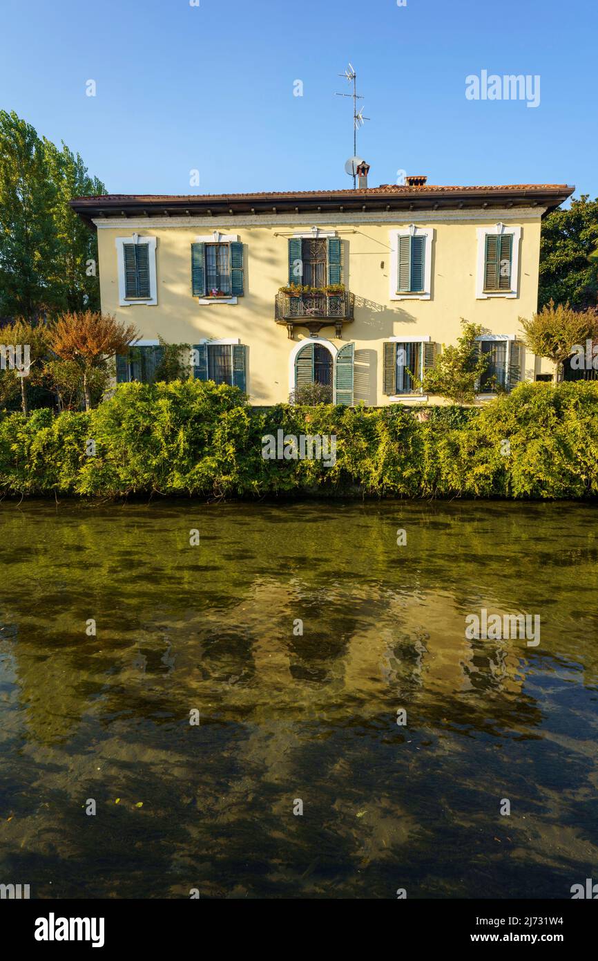 Old buildings along the Martesana canal at Vimodrone, Milan province ...