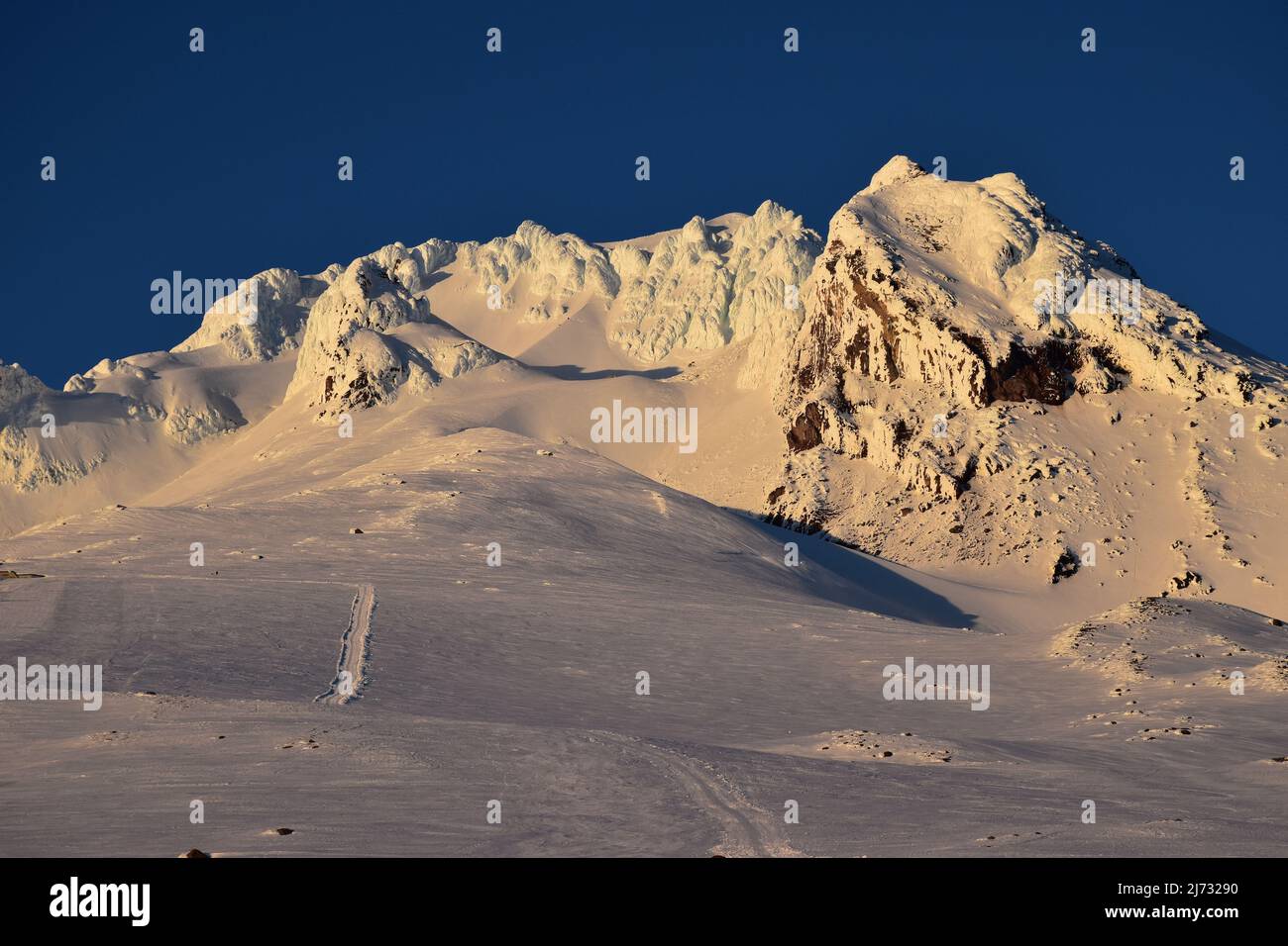 Alpenglow sunset views from the groomed lower section of the climber's ...