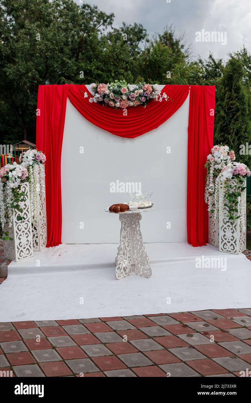 Wedding arch with multi-colored flowers. Wedding decorations Stock ...