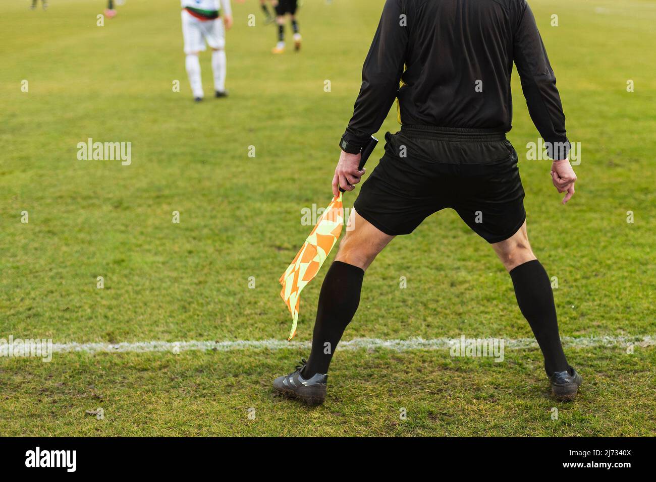 Assistant referee during football match Stock Photo - Alamy