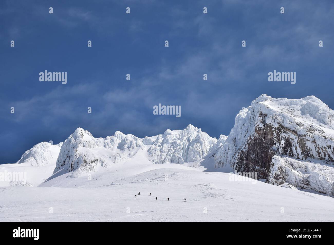 Climbers below the steep icy summit area of Mt Hood, Oregon's highest ...