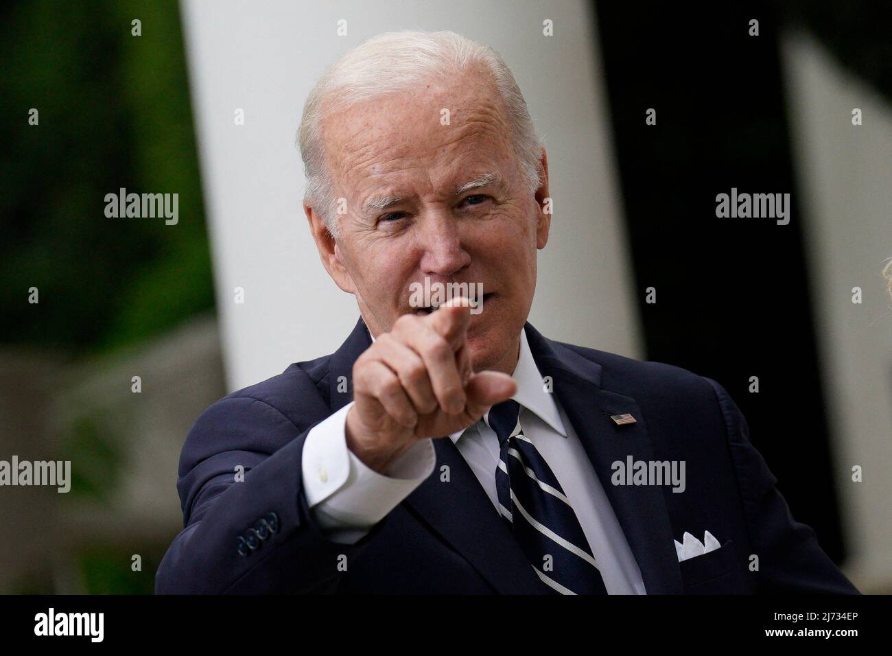 U.S. President Joe Biden with first lady Jill Biden greets guests at a ...