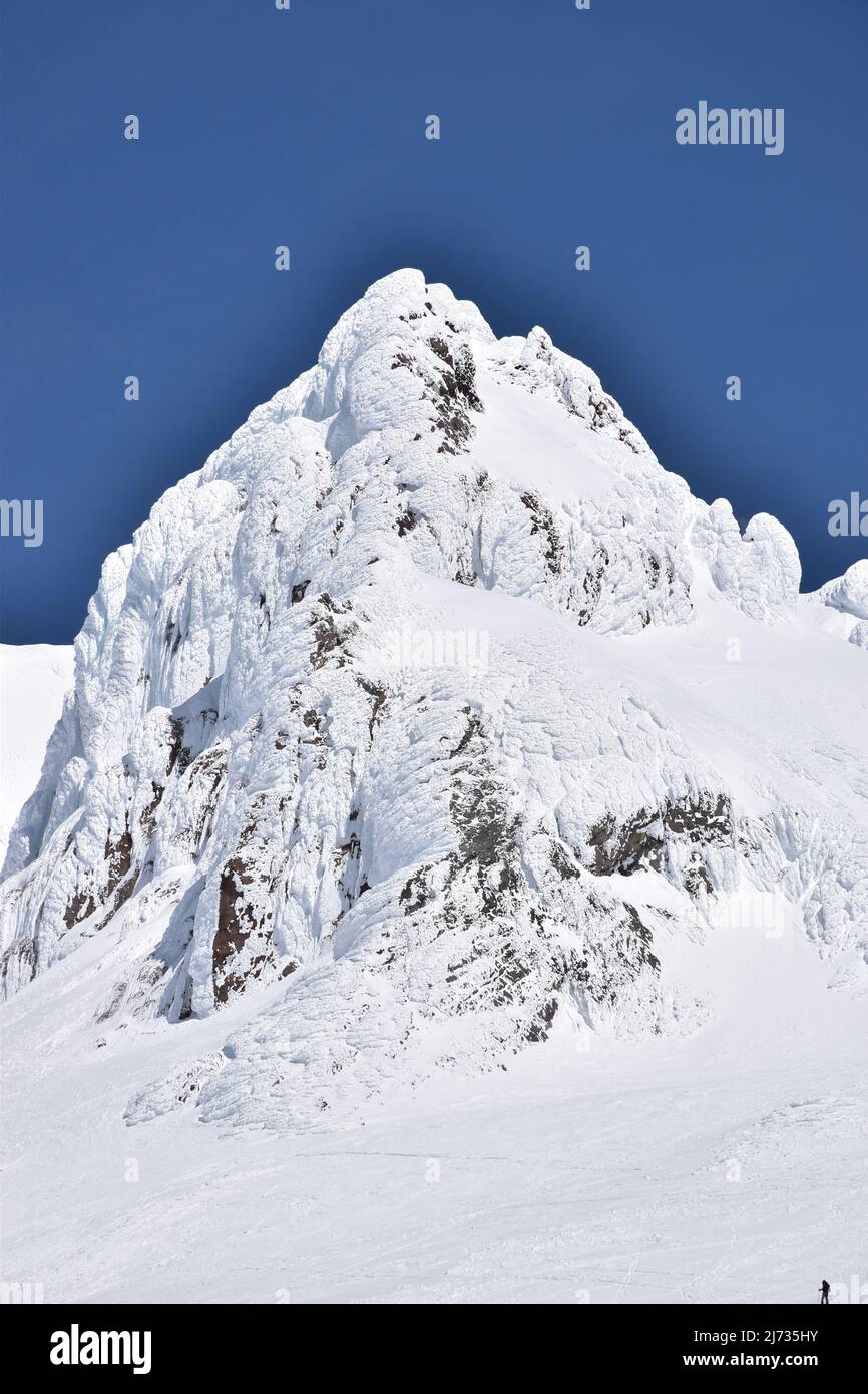 The steep icy summit area of Mt Hood, Oregon's highest mountain, seen ...
