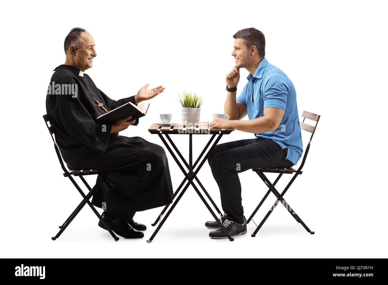 Priest talking to a young man in a cafe isolated on white background ...