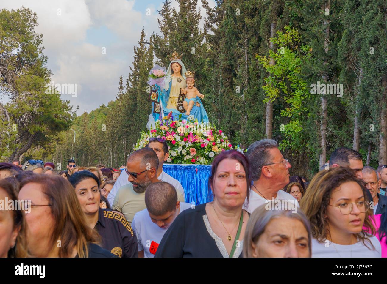 Haifa, Israel - May 01, 2022: Mary statue is pulled up the road by ...