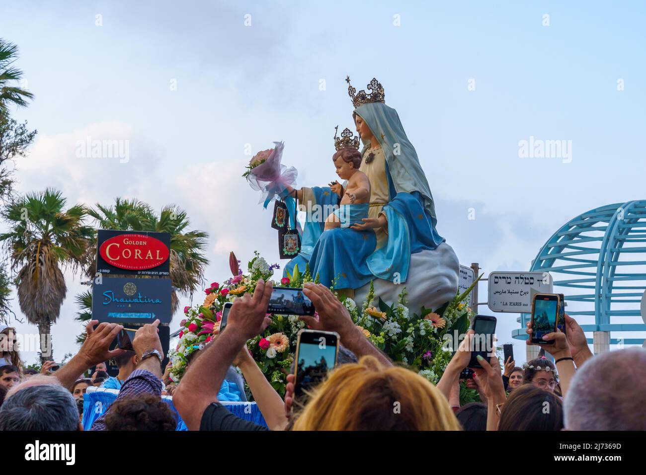 Haifa, Israel - May 01, 2022: Mary statue is photographed by believers ...