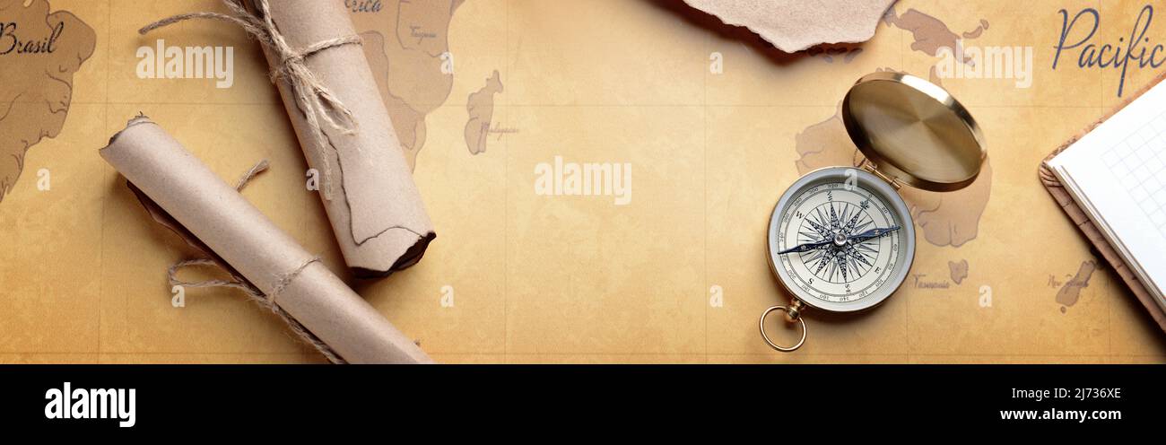 Vintage compass and scrolls on world map. Banner for design Stock Photo ...