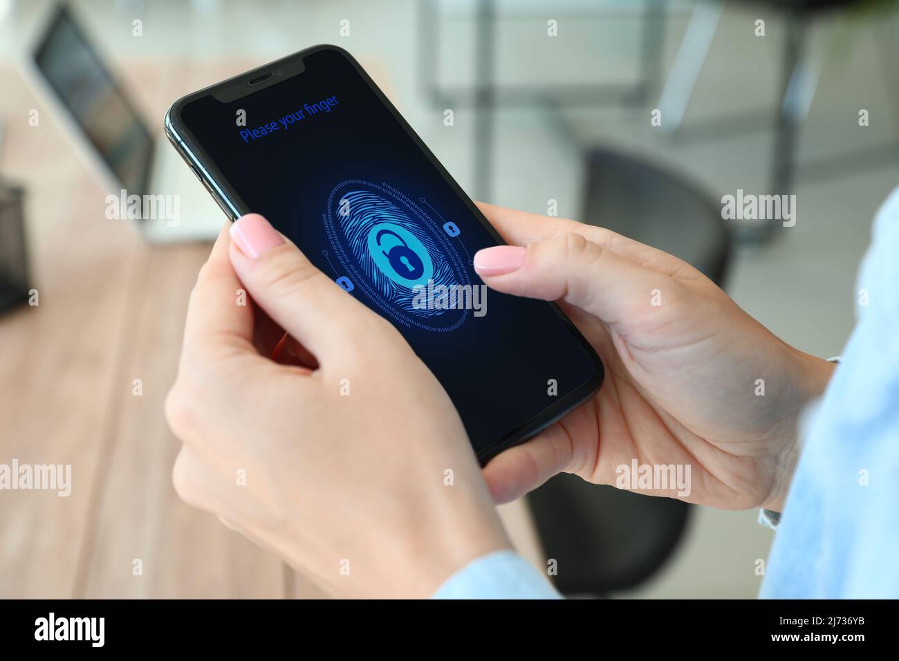 Woman holding smartphone with locked screen, closeup Stock Photo - Alamy
