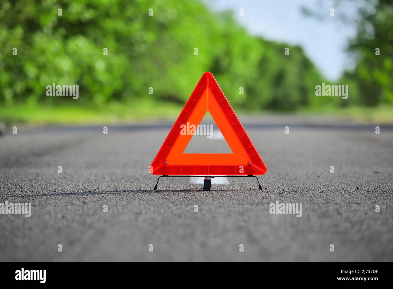 Emergency stop sign as symbol of car accident on road Stock Photo - Alamy