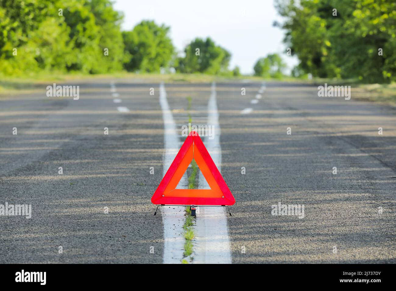 Emergency stop sign as symbol of car accident on road Stock Photo - Alamy