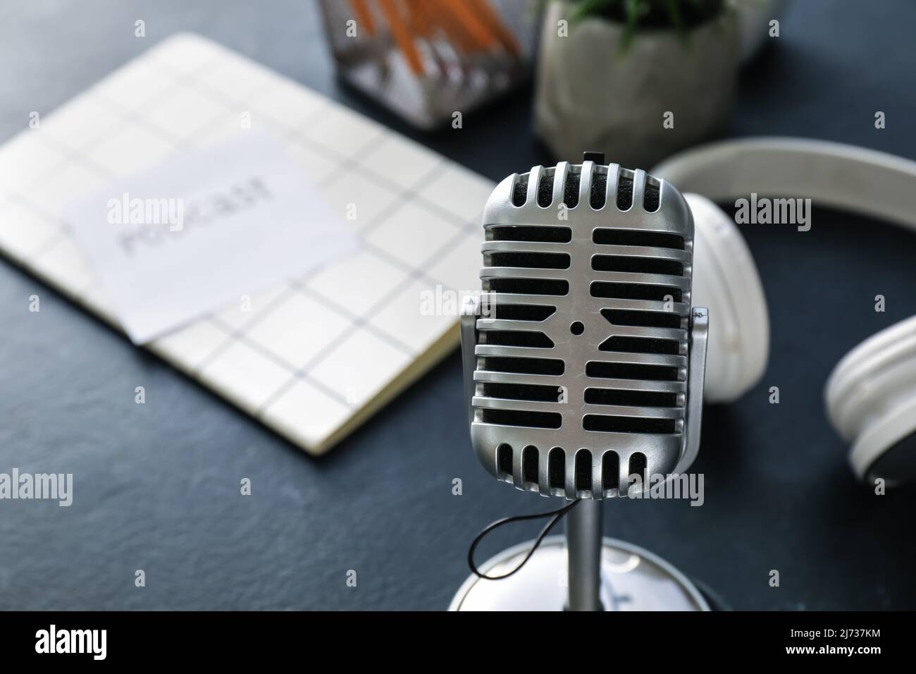 Modern microphone on dark background, closeup Stock Photo - Alamy