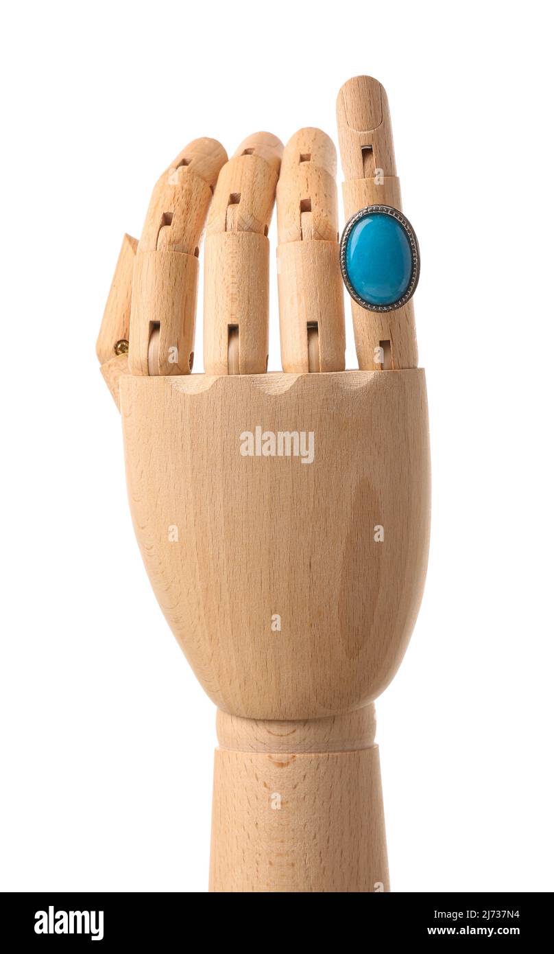 Wooden hand with stylish ring on white background Stock Photo - Alamy