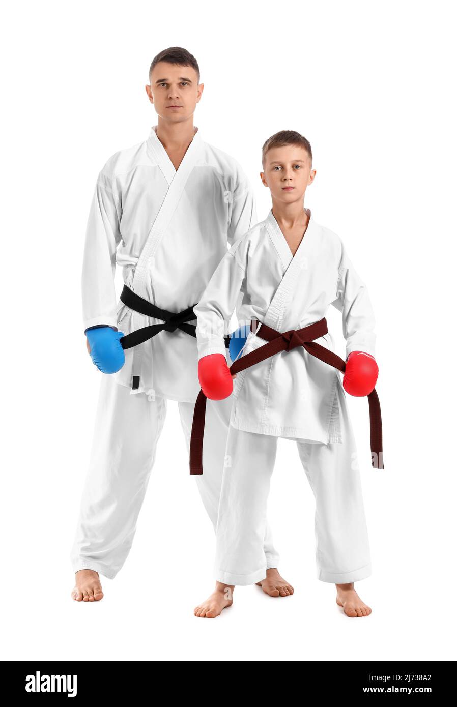 Boy with karate instructor on white background Stock Photo - Alamy