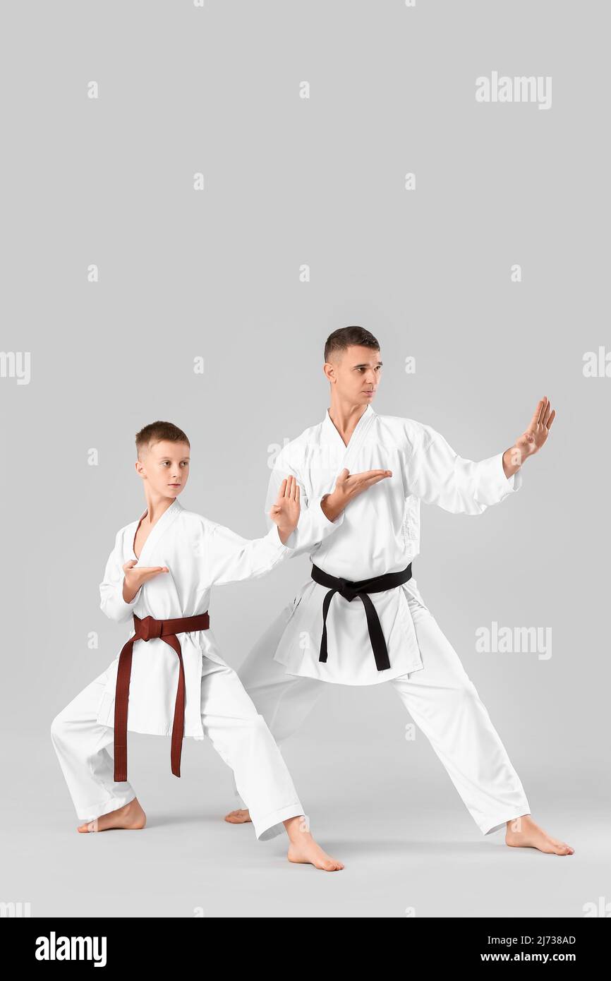 Boy practicing karate instructor hi-res stock photography and images ...