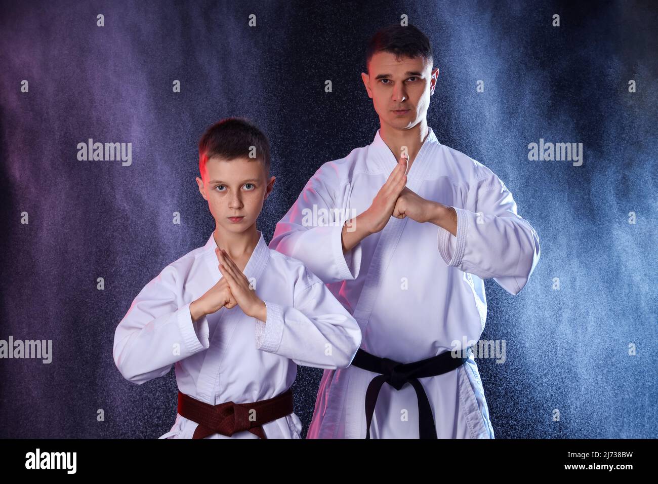 Boy practicing karate instructor hi-res stock photography and images ...