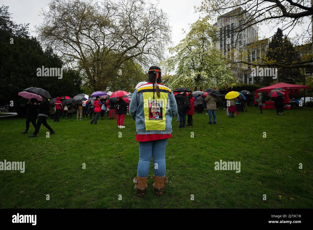 Vancouver, Canada, May 5, 2022. People attend a Red Dress Day ceremony ...