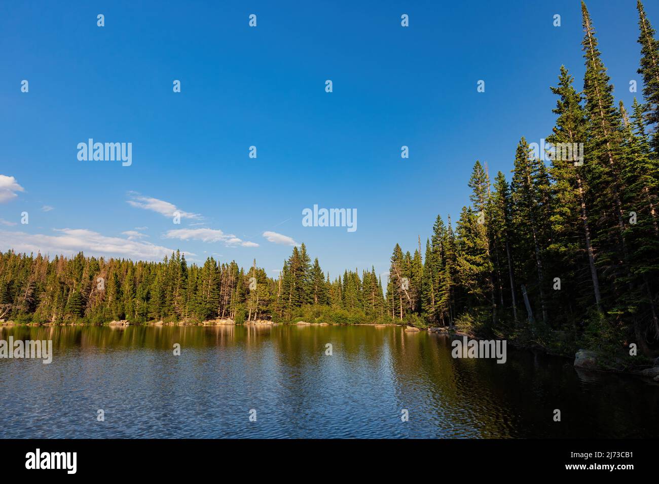 Sunny view of the beautiful Bear Lake at Rocky Mountain National Park ...