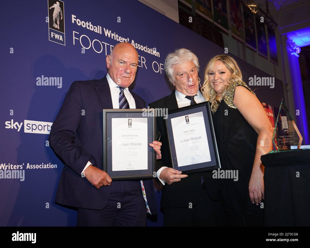 Patrick Barclay (left) and Mike Collett are presented the Ivan Sharpe ...