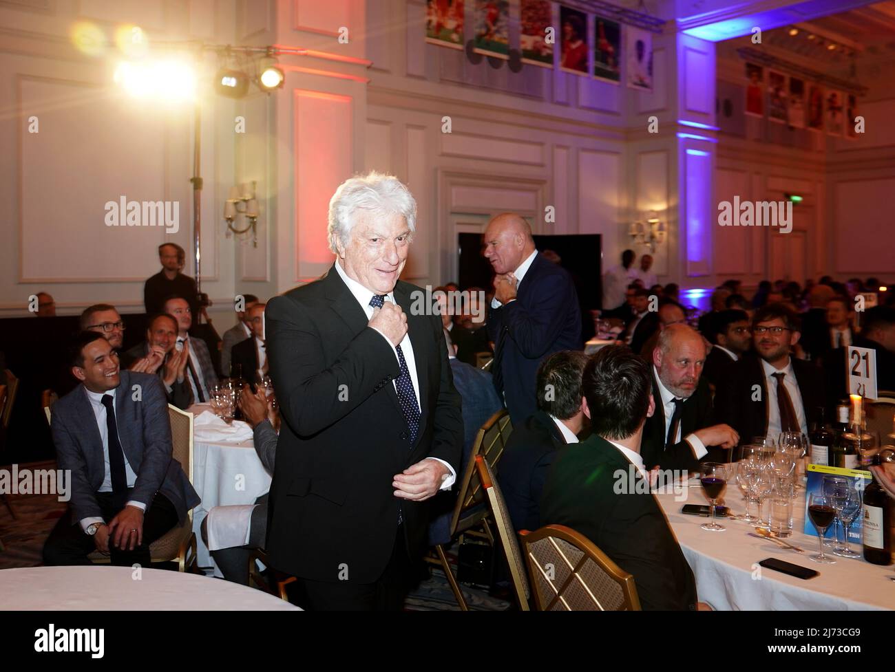 Patrick Barclay (left) and Mike Collett go up to collect their Ivan ...