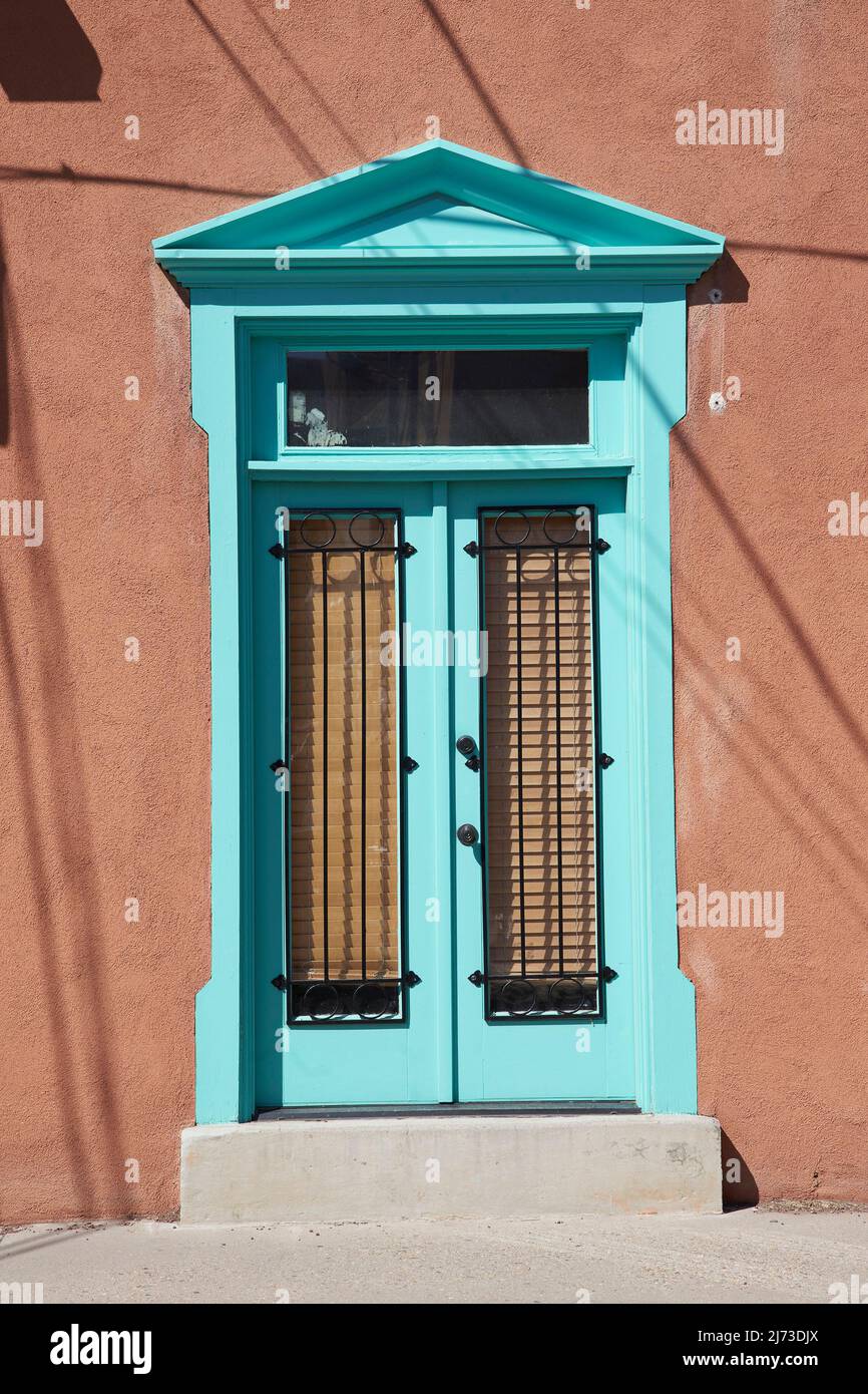 Adobe building with turquoise accents in Santa Fe, New Mexico Stock ...