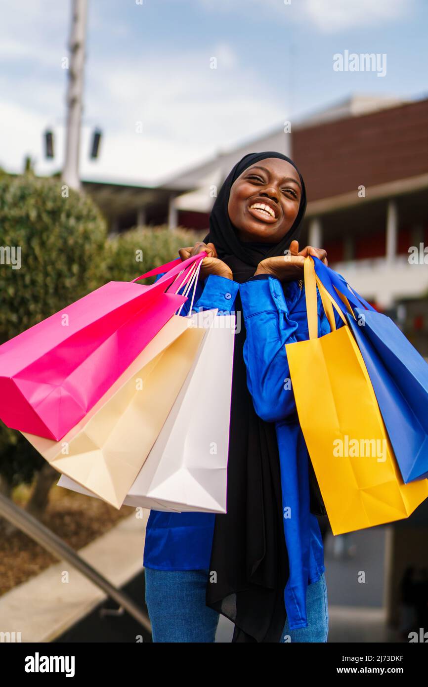 Trendy female shopper hi-res stock photography and images - Alamy