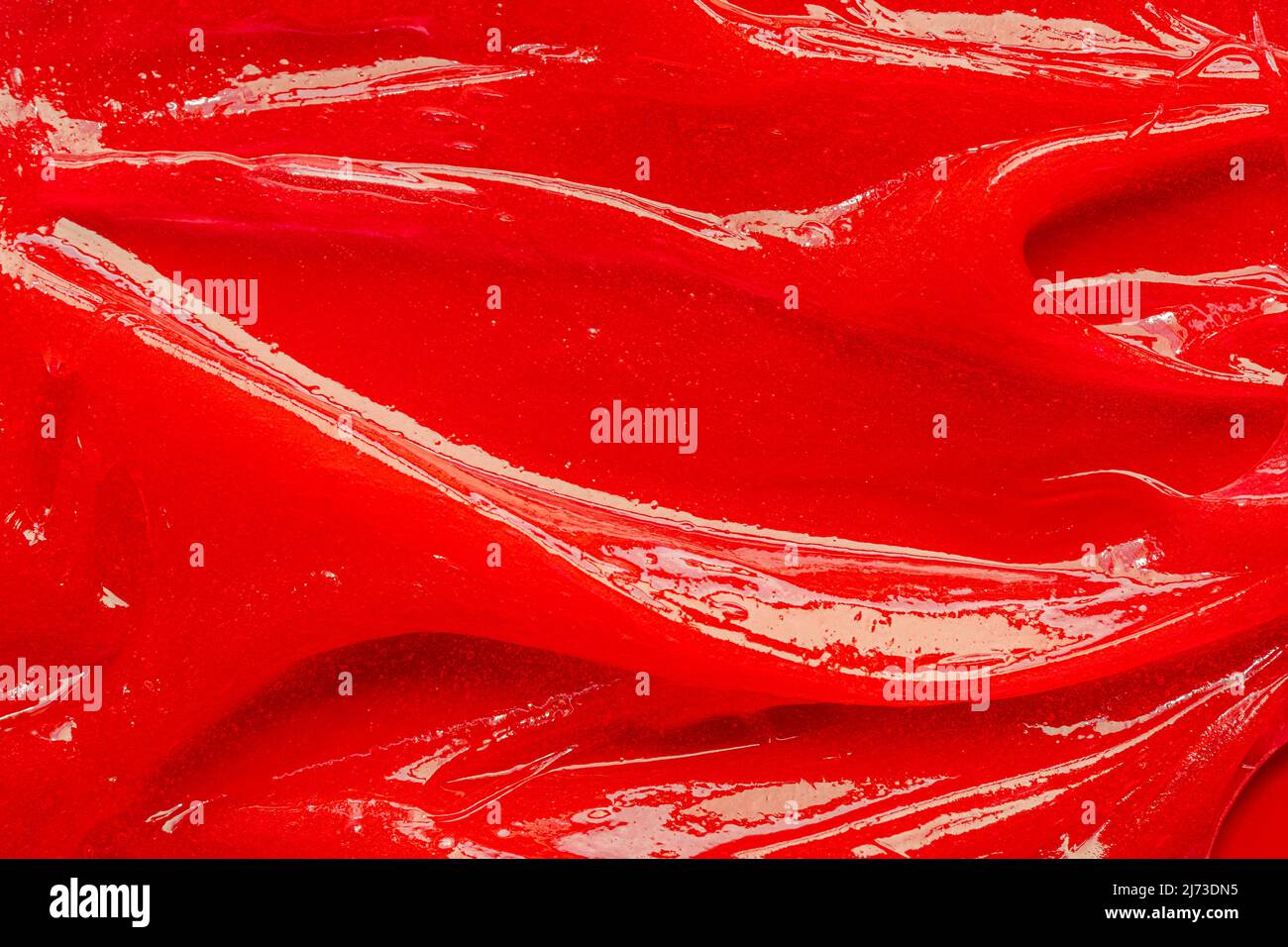 Red gel texture. Cosmetic clear liquid cream smudge. Skin care product ...