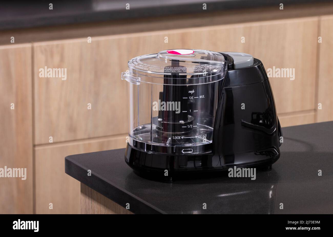 Modern electric chopper in the kitchen Stock Photo - Alamy