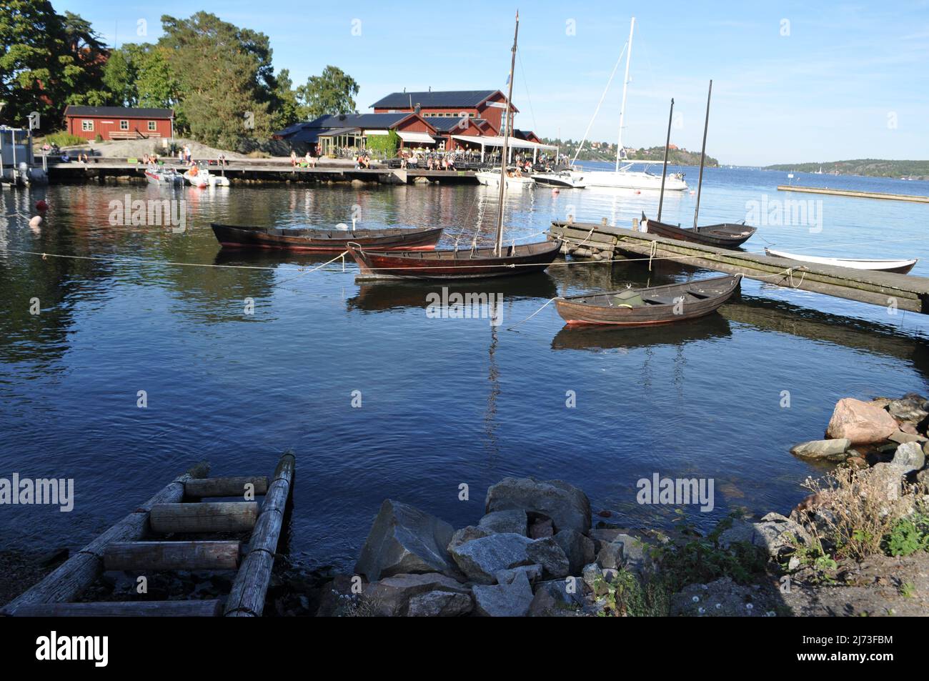 A small harbour in a snapshot of summer island life in Stockholm ...