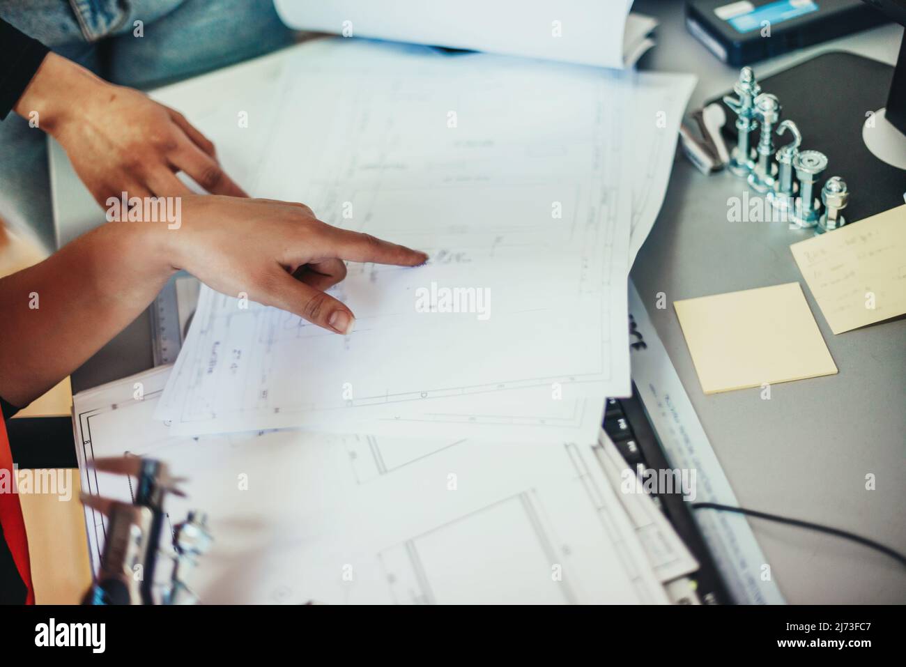 Engineer technician designing drawings mechanical parts engineering ...