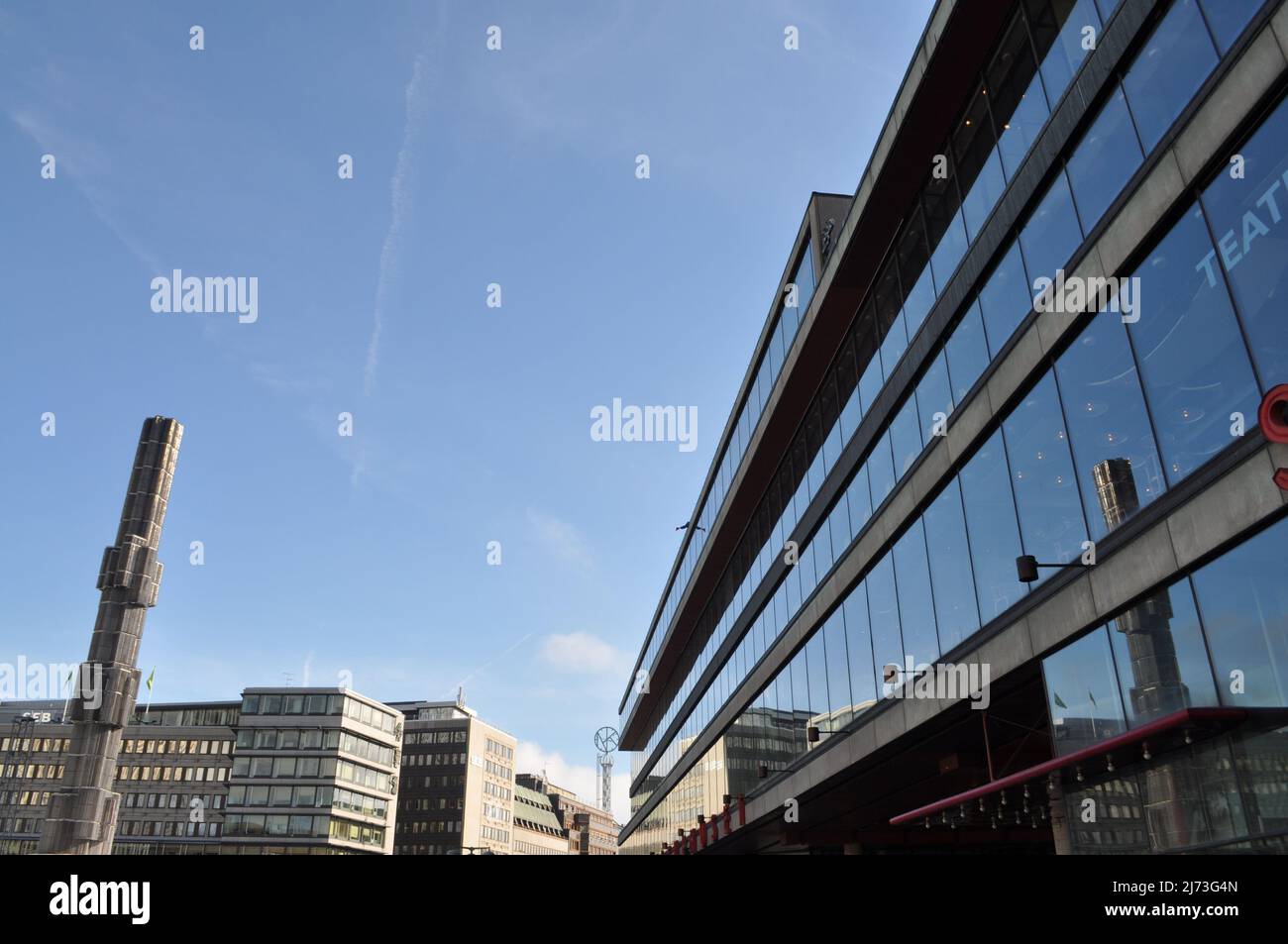 People walking on the street amid a landscape of functional modern ...