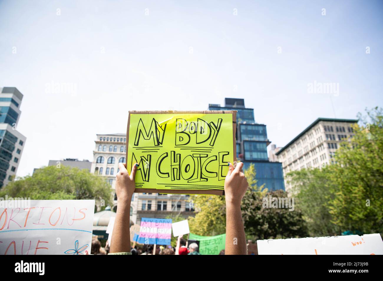 Protester holds sign saying, "My body, my choice" during the ...