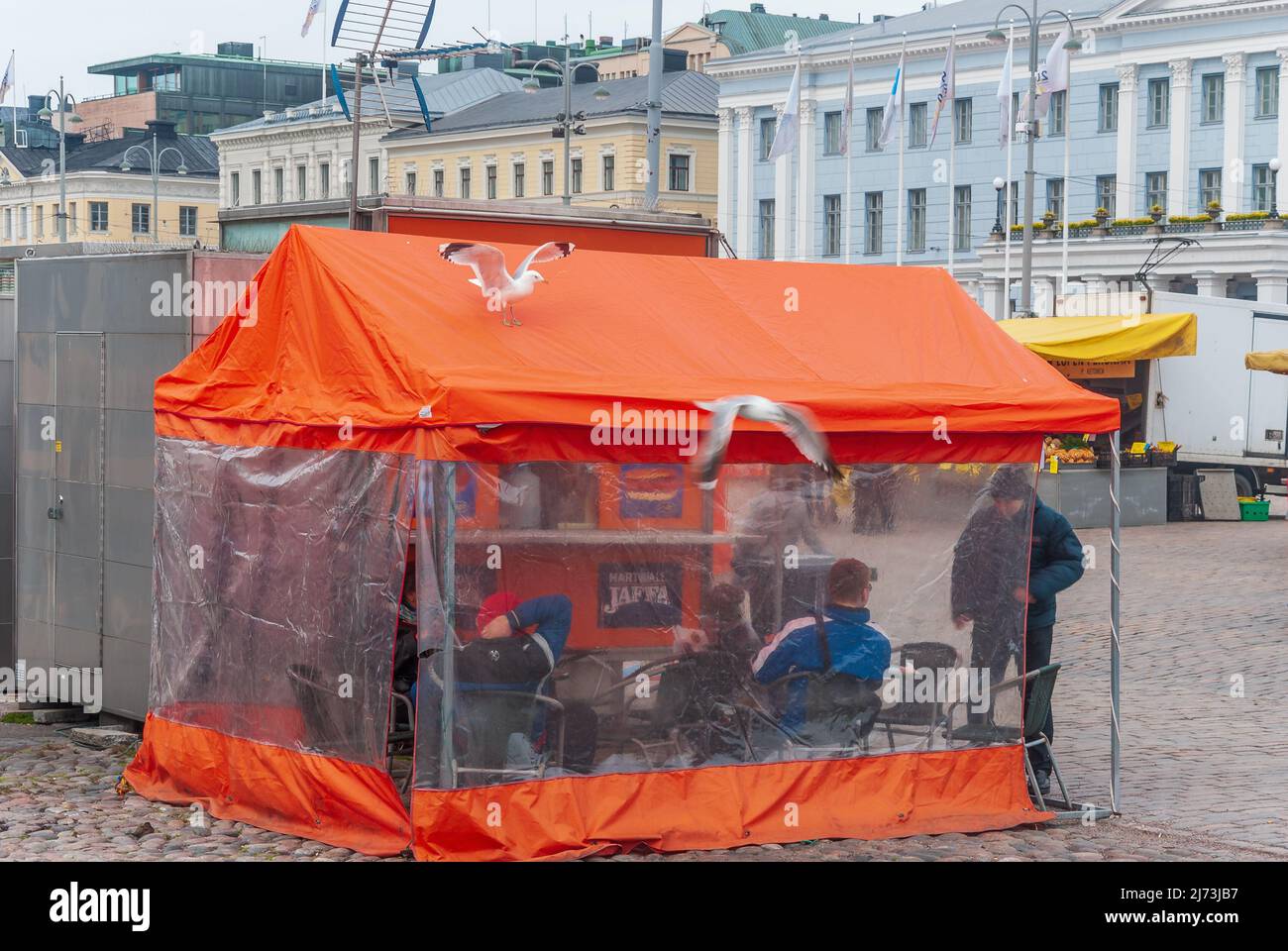 Orange colour canfas coffee tent with transparent plastic walls at ...