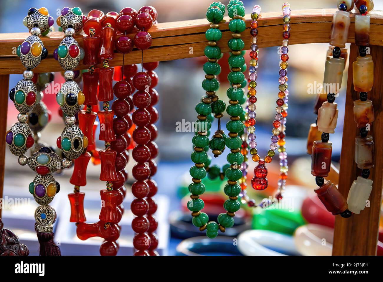 Colorful gemstone necklaces and pendants for sale in the market Stock ...