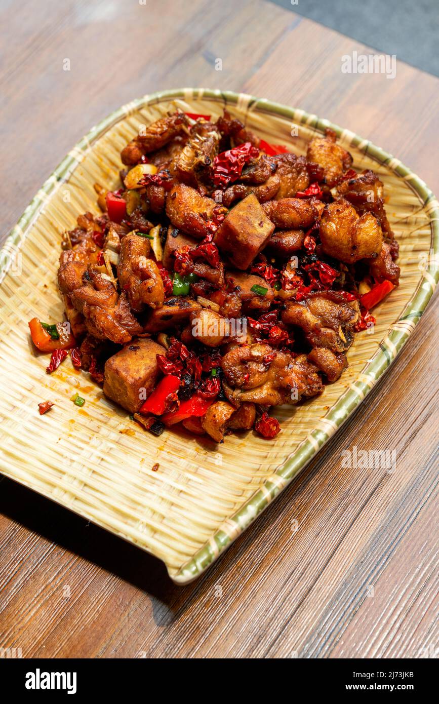 A classic dry fragrant and delicious Sichuan dish, spicy chicken Stock ...