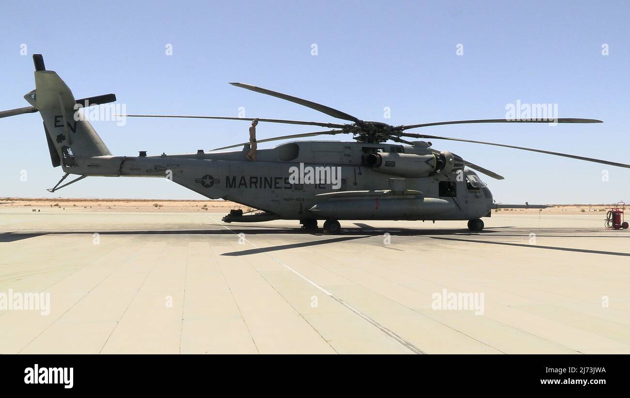 A U.S. Marine with Marine Heavy Helicopter Squadron (HMH) 464 performs ...