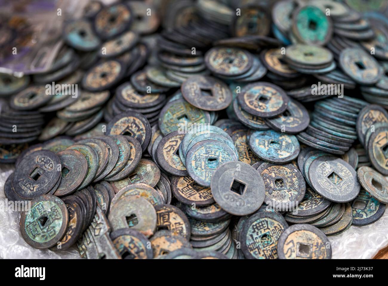 A closeup of a pile of rusty ancient Chinese coins Stock Photo - Alamy