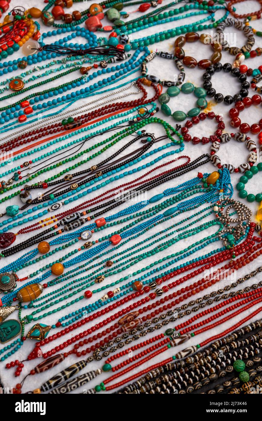 Colorful gemstone necklaces and pendants for sale in the market Stock ...