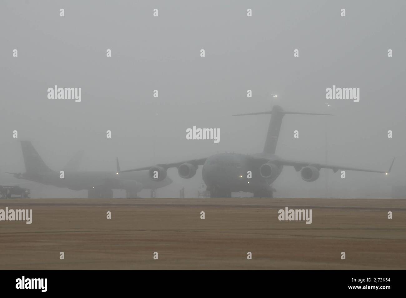 A C-17 Globemaster III taxis on the flight line due to incoming severe ...