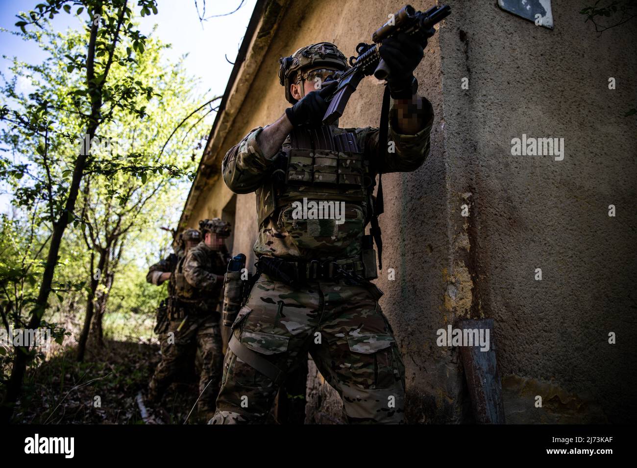 A U.S. Army Green Beret assigned to 10th Special Forces Group pulls ...