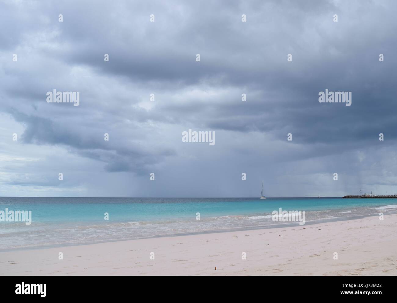 Dramatic sky and rain over Barbados gorgeous beach Stock Photo - Alamy