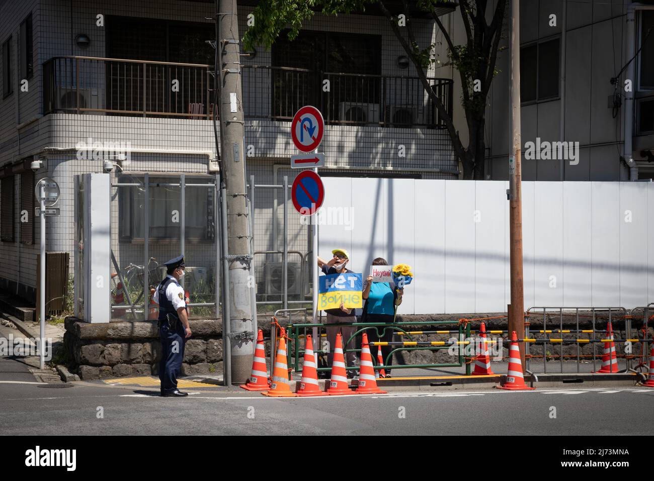 Protesters in front of the Russian Embassy in Tokyo shout anti-war ...