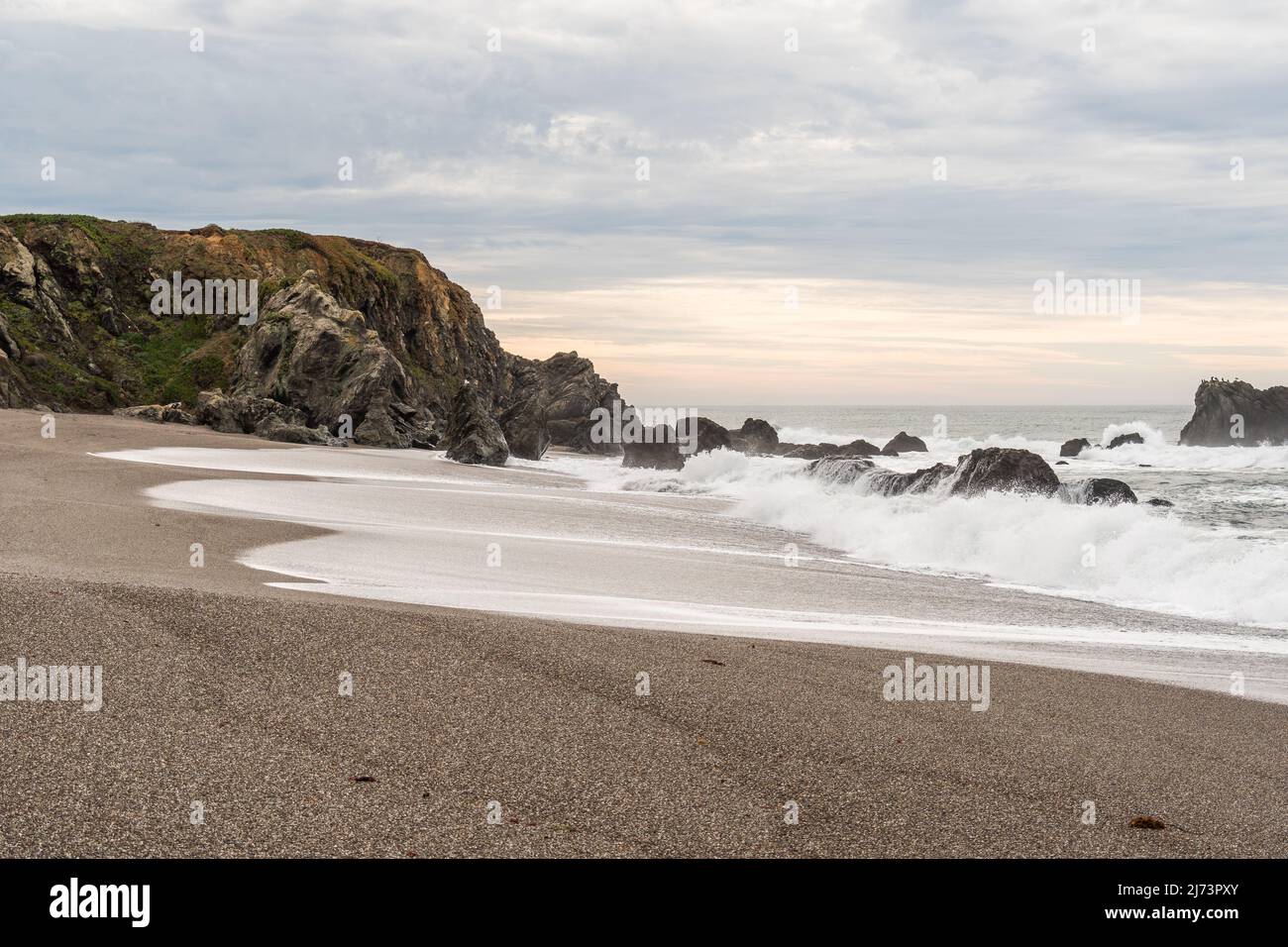 Rocky northern California coastline cliff and beach near Bodega Bay ...