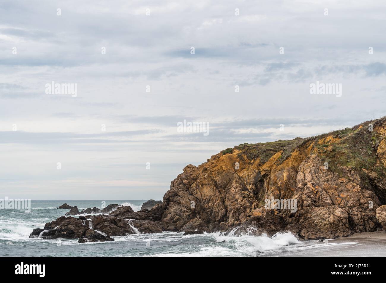 Rocky northern California coastline cliff and beach near Bodega Bay ...